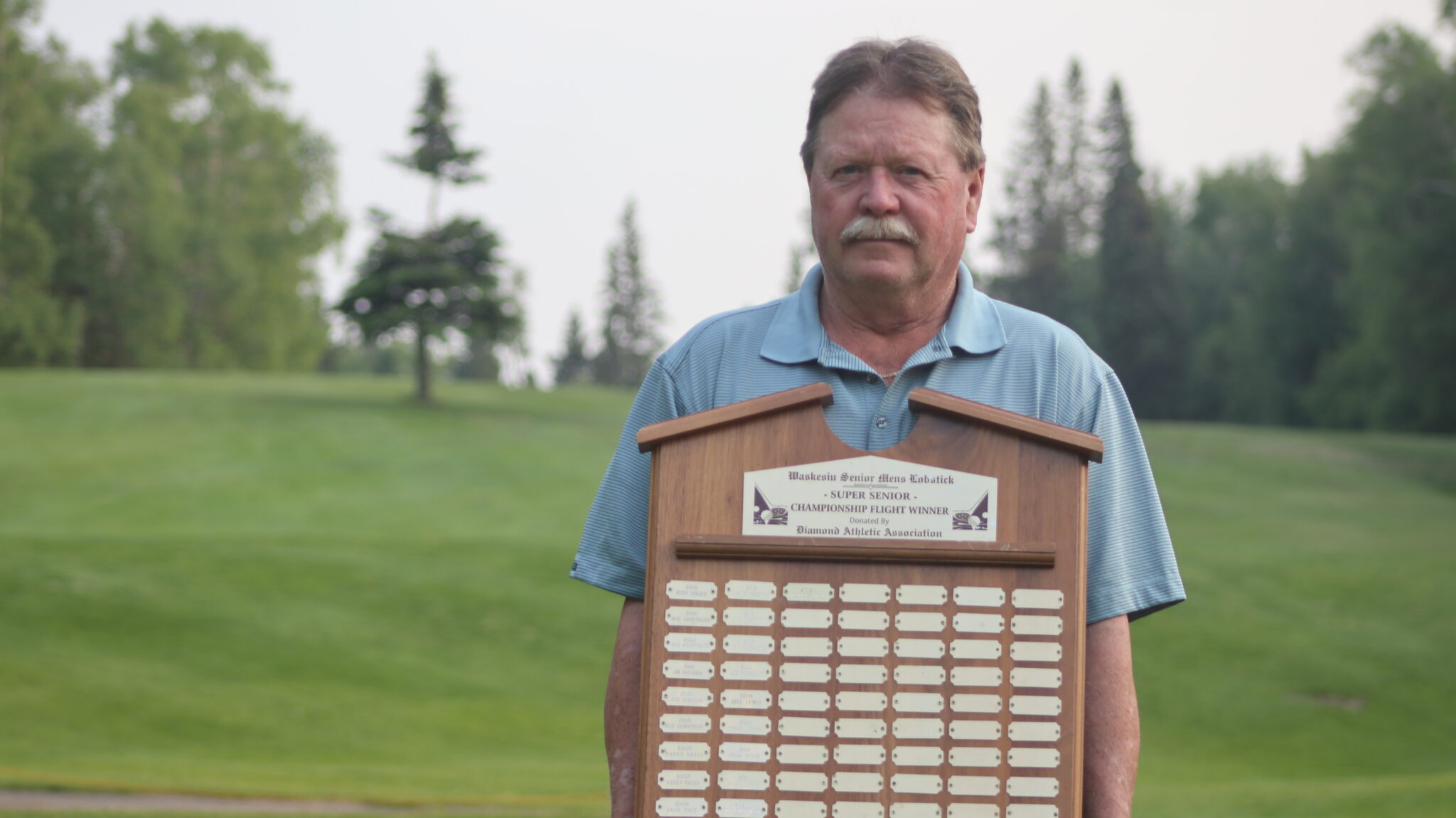 Hallberg wins first Senior Lobstick; Grolla takes Super-Senior plague ...